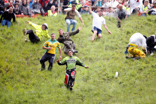 Thrills and spills at UK’s cheese rolling race