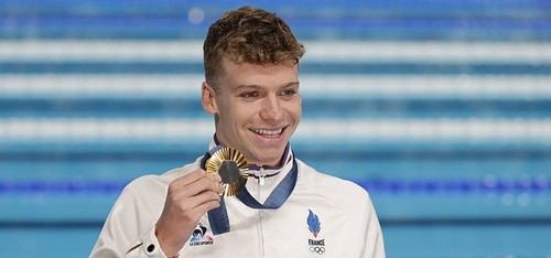 French swimmer sets Olympic record